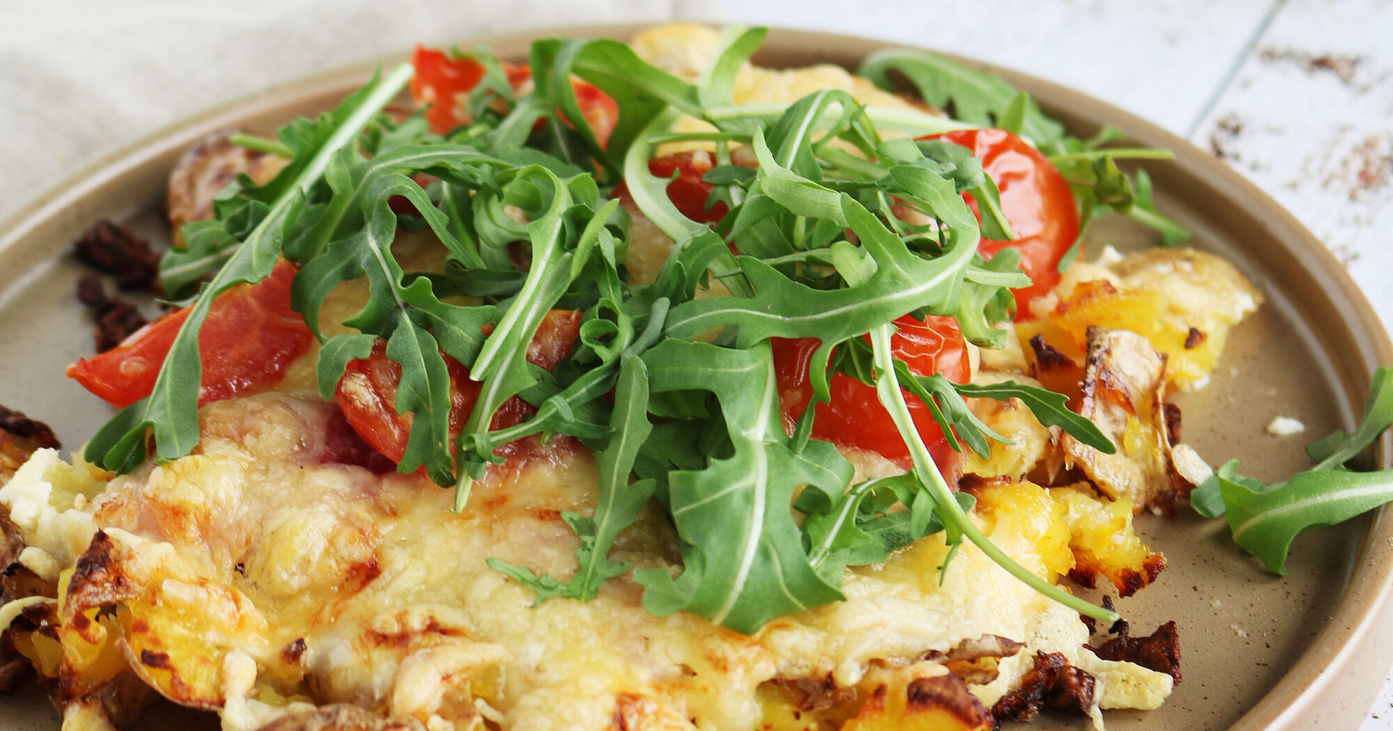 Knusprige Kartoffel-Pizza mit Rucola